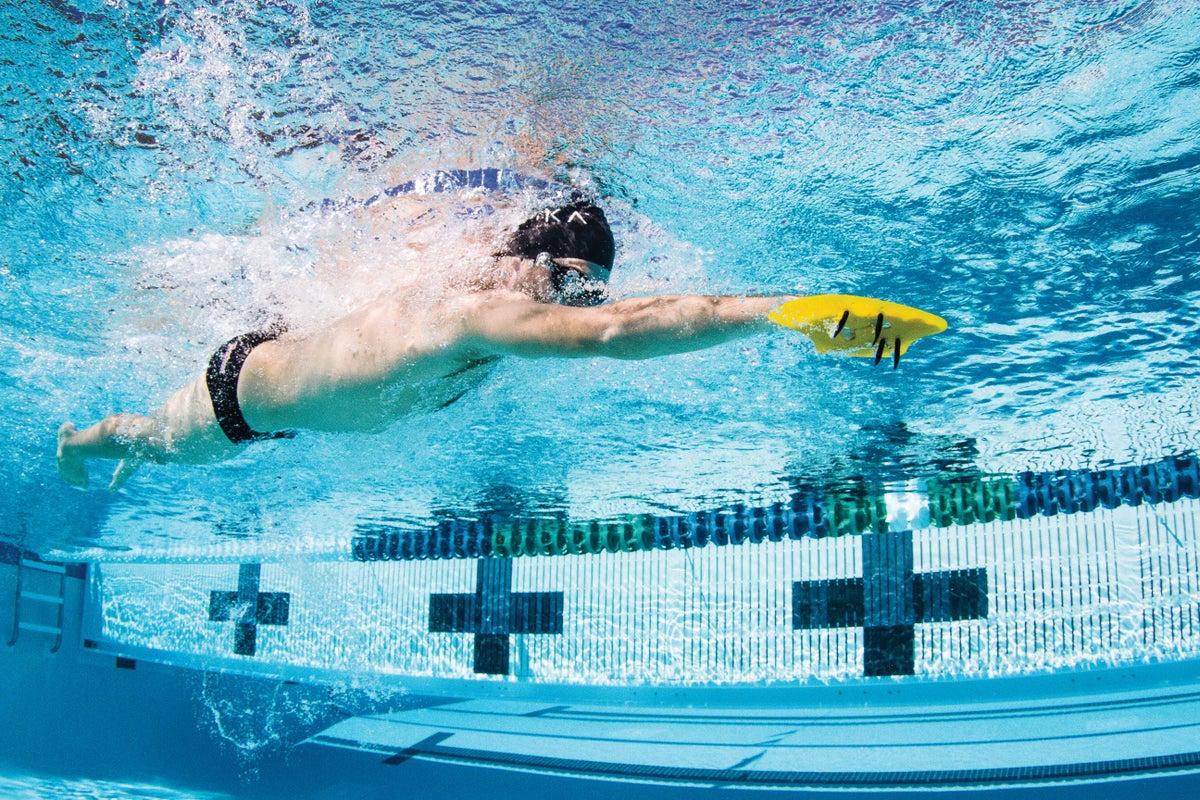 The Proper Way To Add Paddles To Your Swim Training – Triathlete